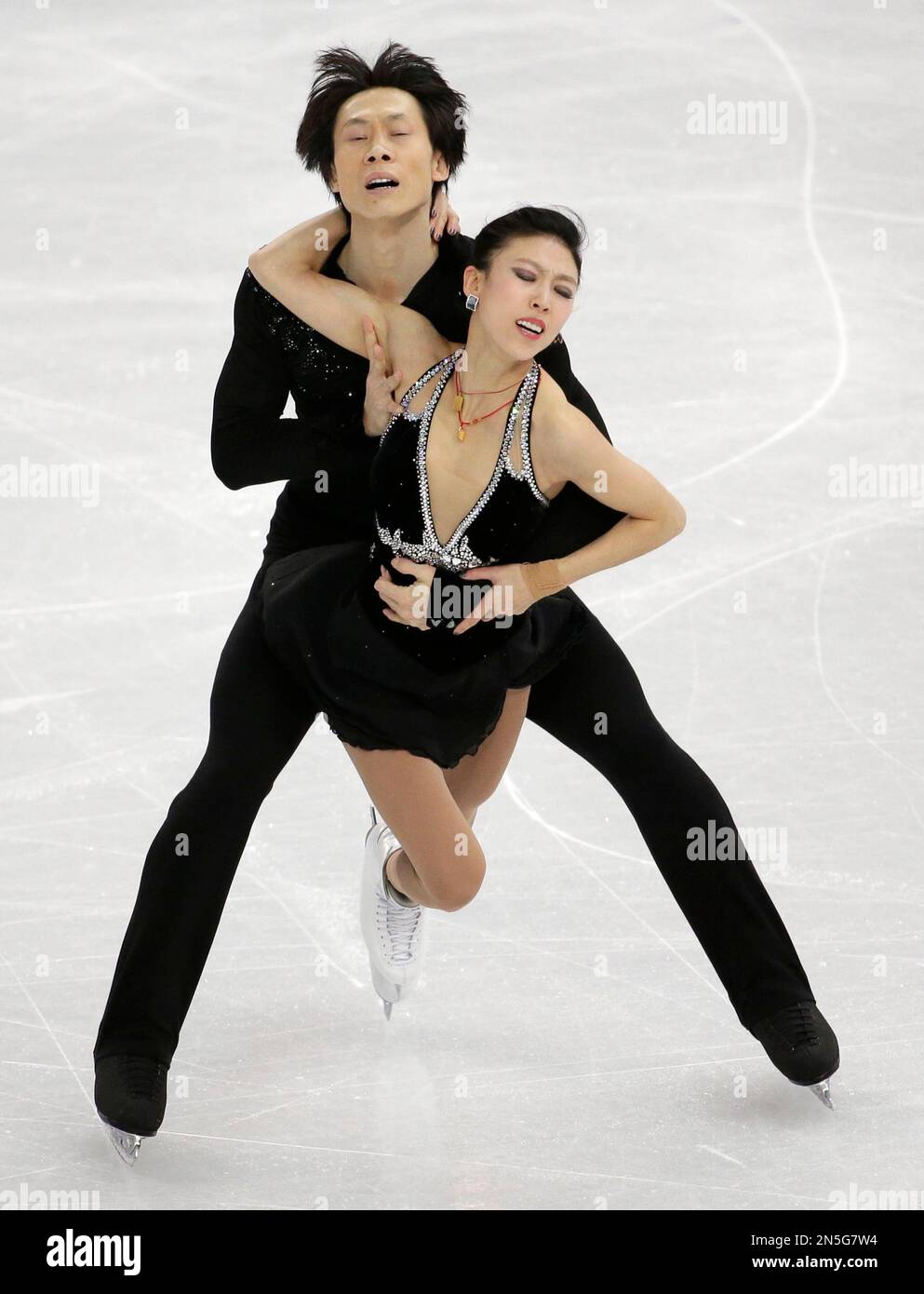 Pang Qing and Tong Jian of China compete in the pairs short program ...