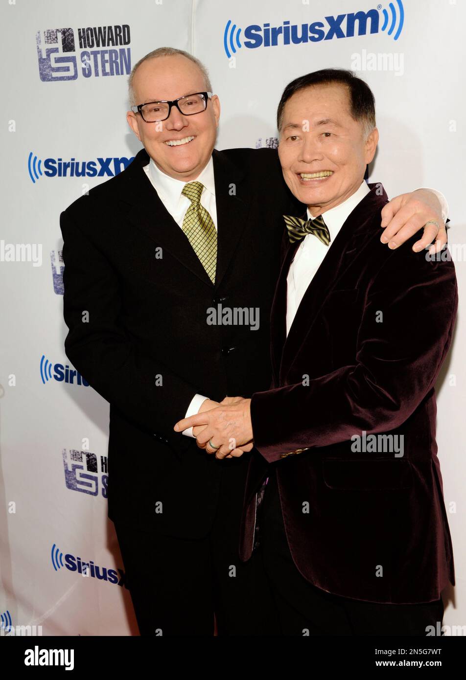 Actor George Takei, right, and husband Brad Altman attend "Howard Stern ...