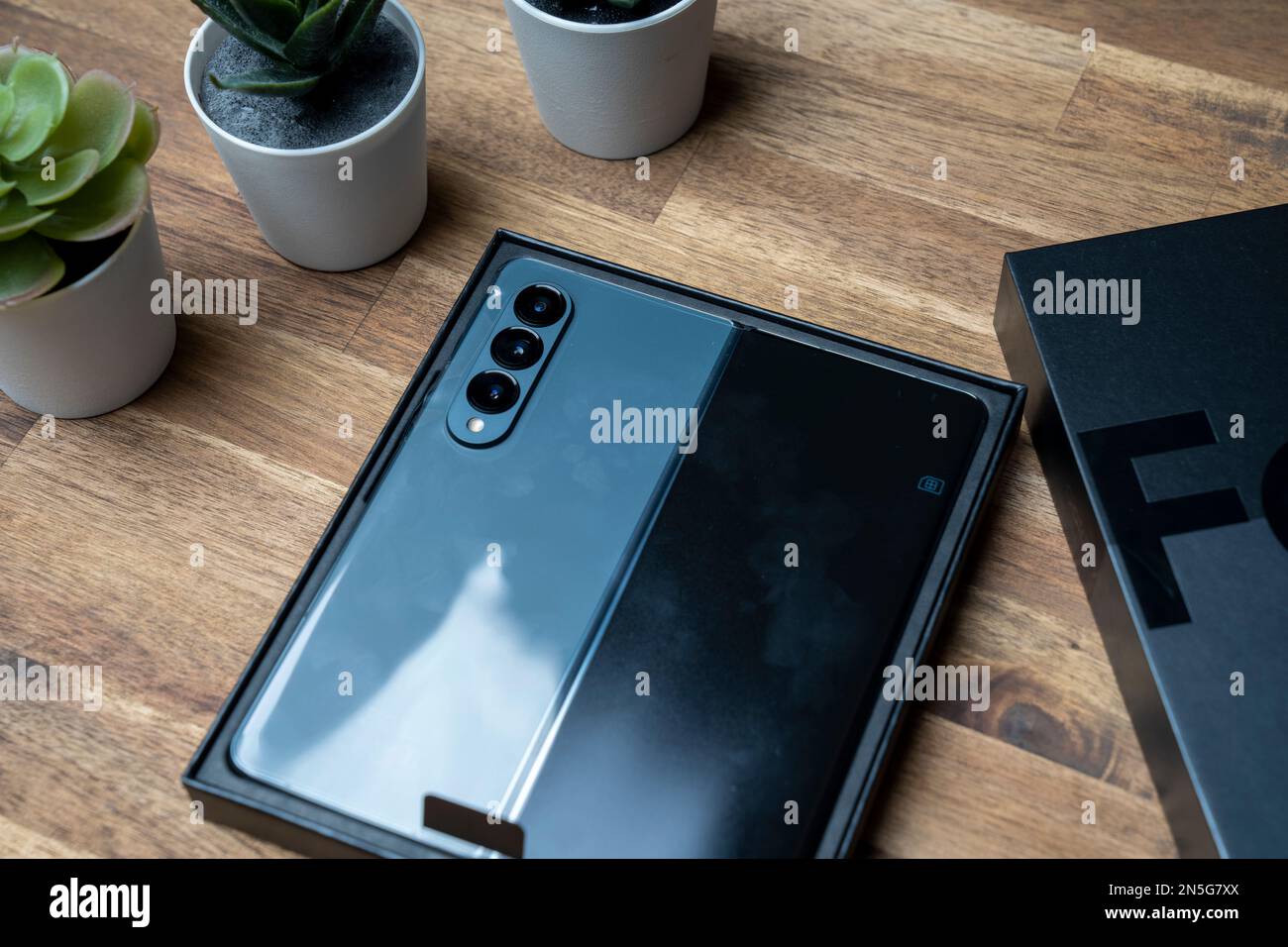 Brand new Samsung Galaxy Z Fold 4 in grey-green color. The device is in ...