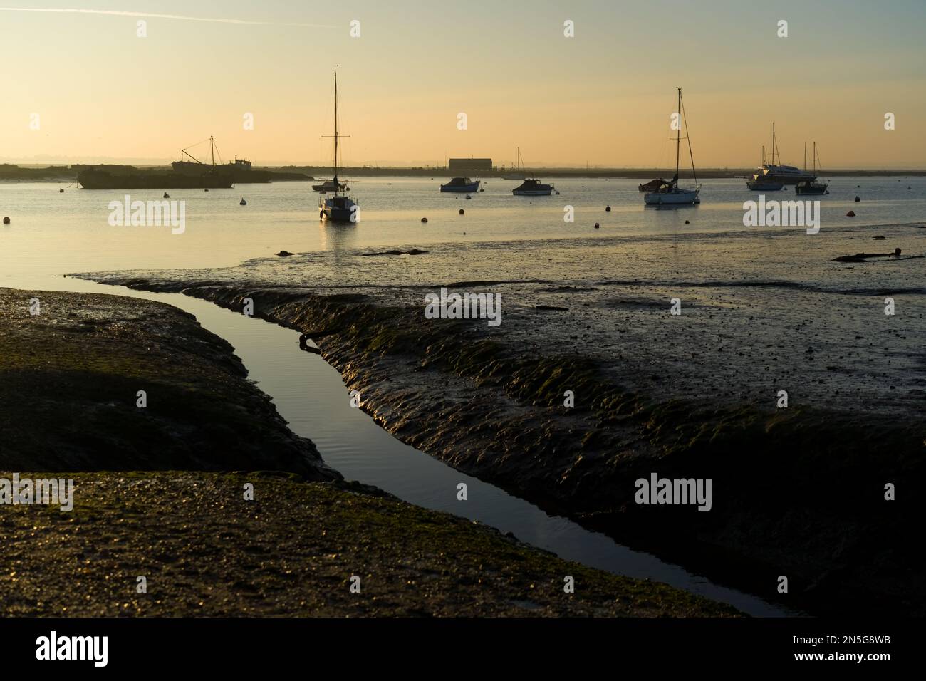 Sunset over the Essex island of Mersea Stock Photo - Alamy