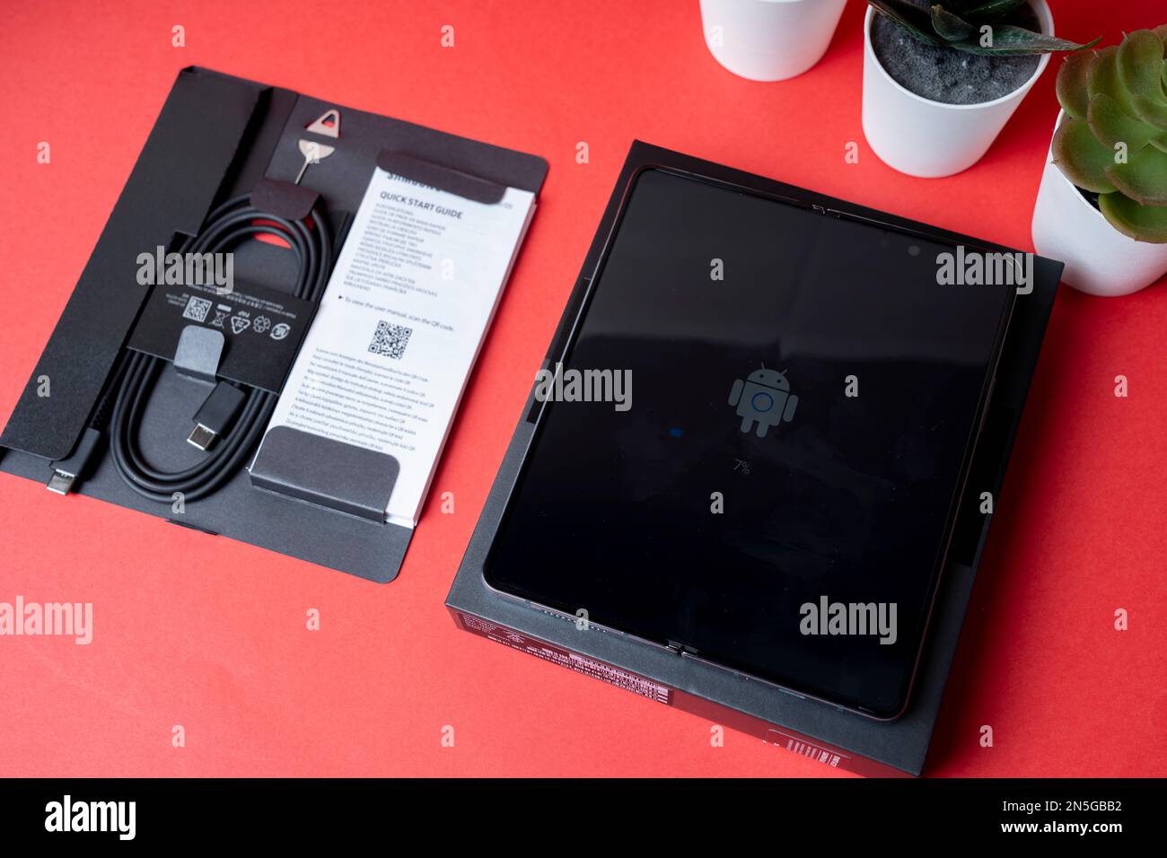 Brand new Samsung Galaxy Z Fold 4 in grey-green color. The device is in ...