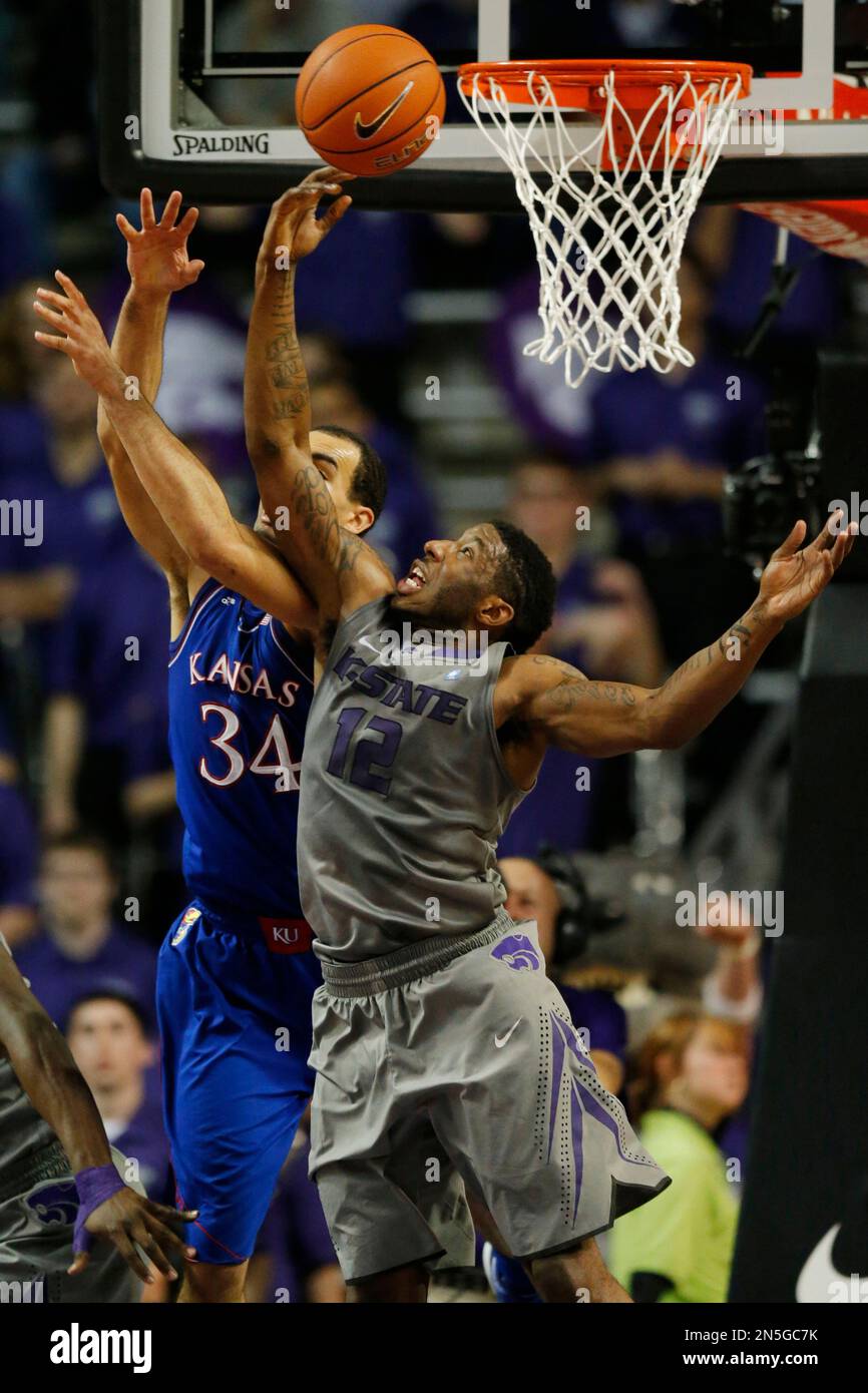 Kansas State guard Omari Lawrence (12) and Kansas forward Perry Ellis ...
