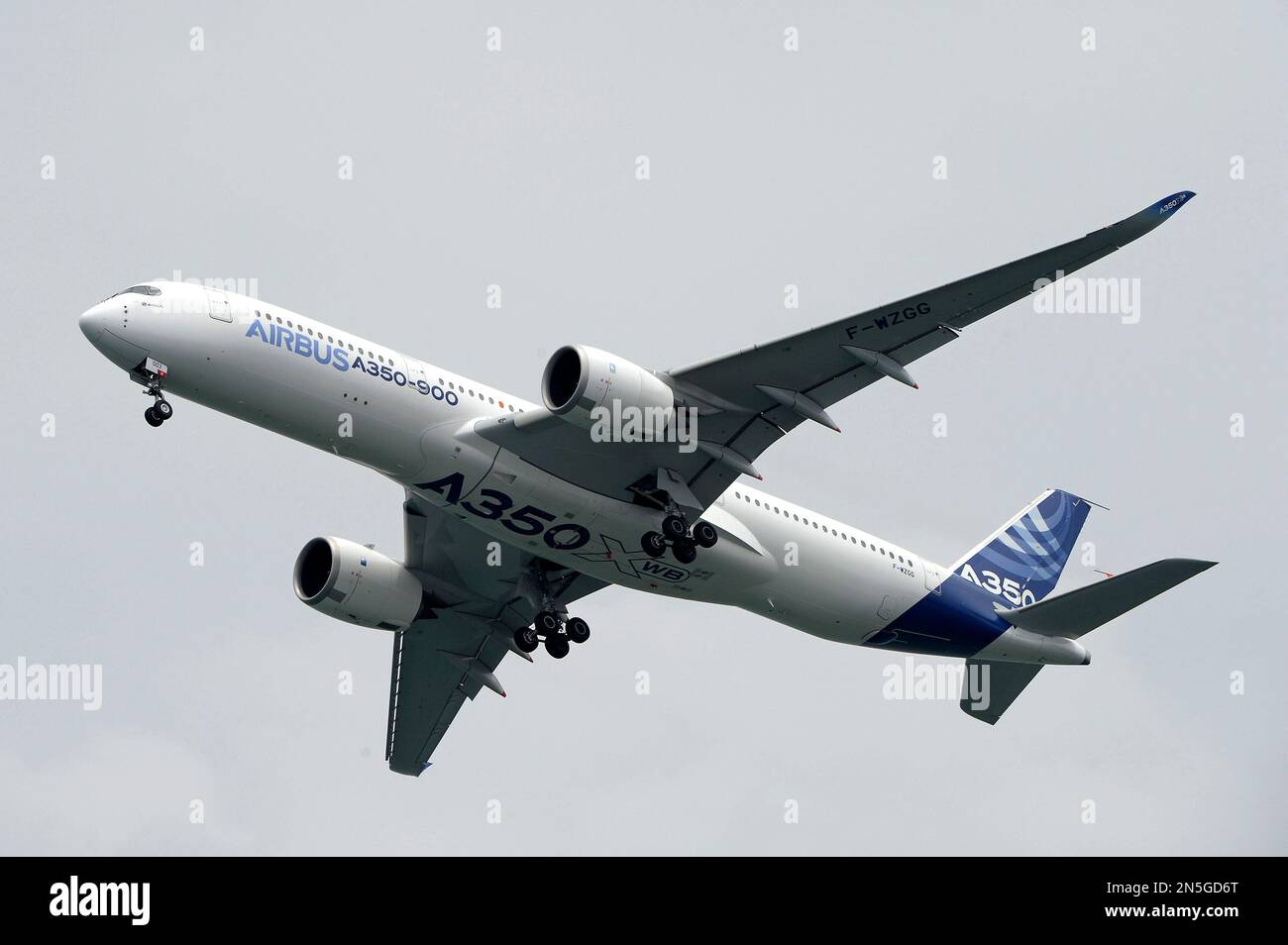 The Airbus A350-900 flies in the aerial display on the first day of the ...