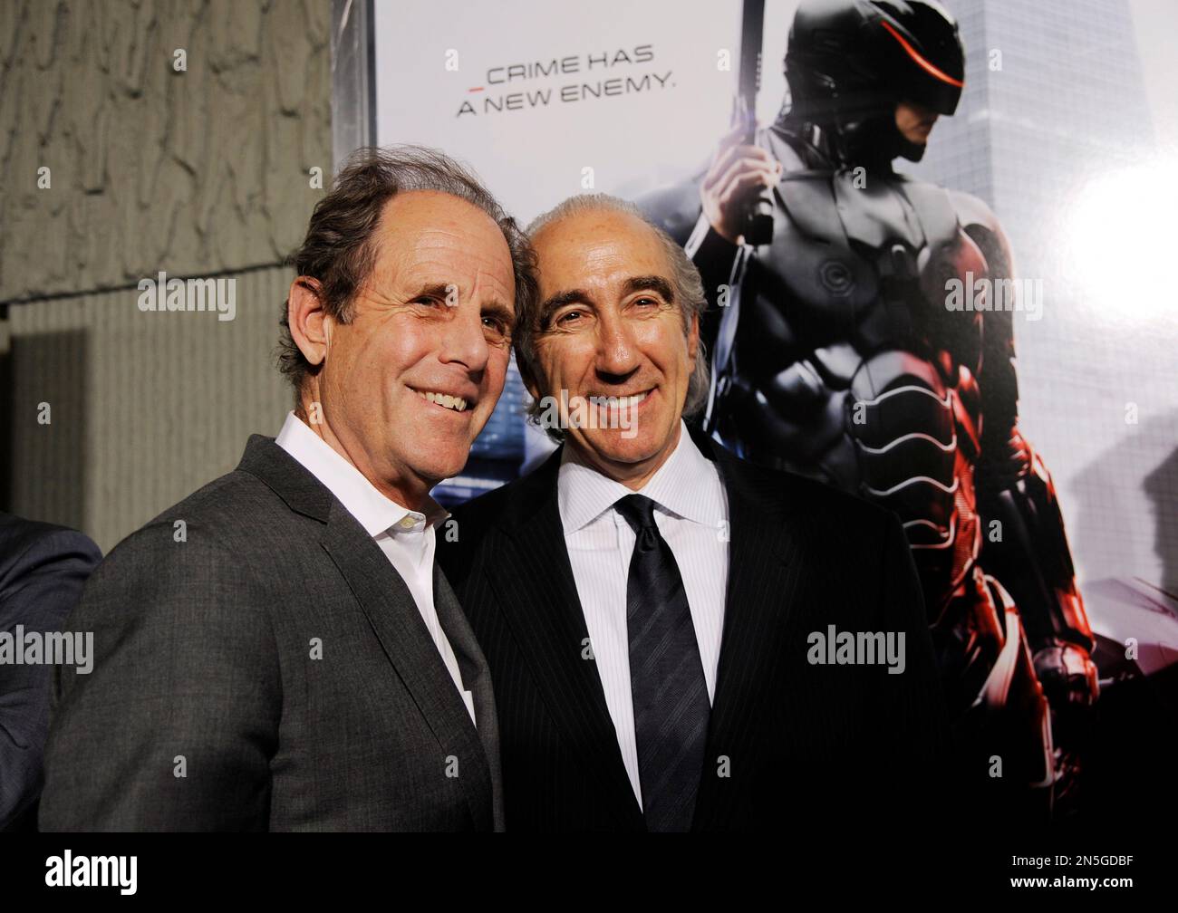 Marc Abraham, left, producer of "Robocop," poses with MGM Chairman and ...