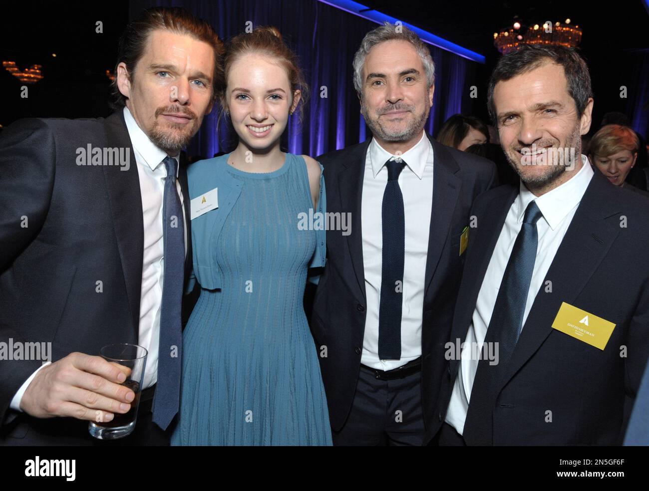 From left, Ethan Hawke, daughter Maya Thurman-Hawke, Alfonso Cuaron and ...