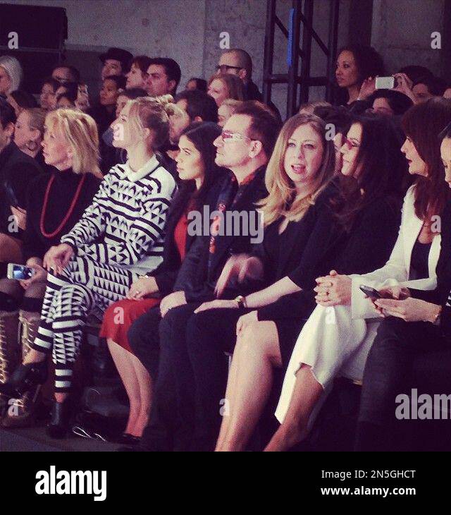 Chelsea Clinton between Bono and his wife, Ali Hewson, at the Edun ...