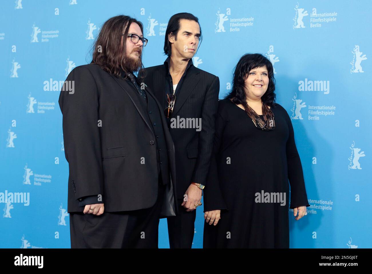 Musician Nick Cave, centre, with artists/directors Iain Forsyth, left ...