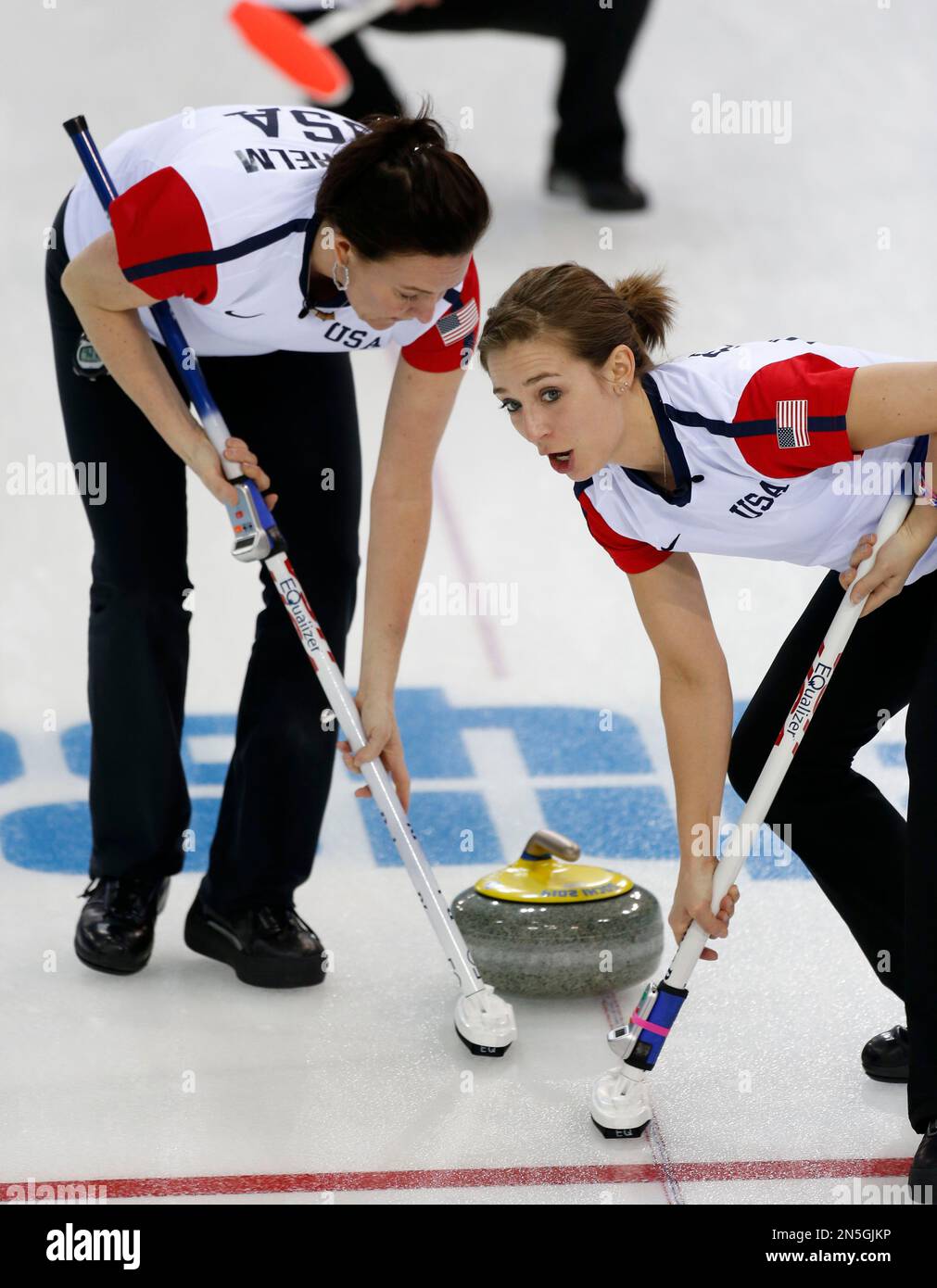 Team USA's Ann Swisshelm, left, and Jessica Schultz, sweep ahead of the ...