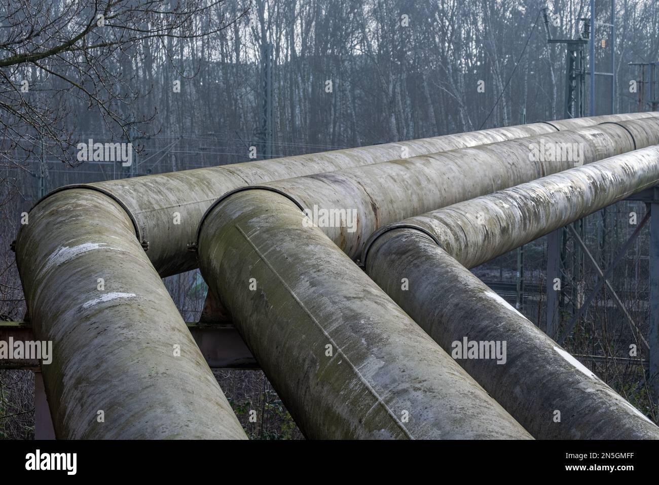 view of 3 large metal district heating pipes next to each other Stock ...