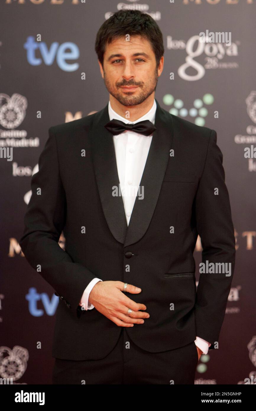 Spanish actor Hugo Silva poses for photographers on the red carpet ...