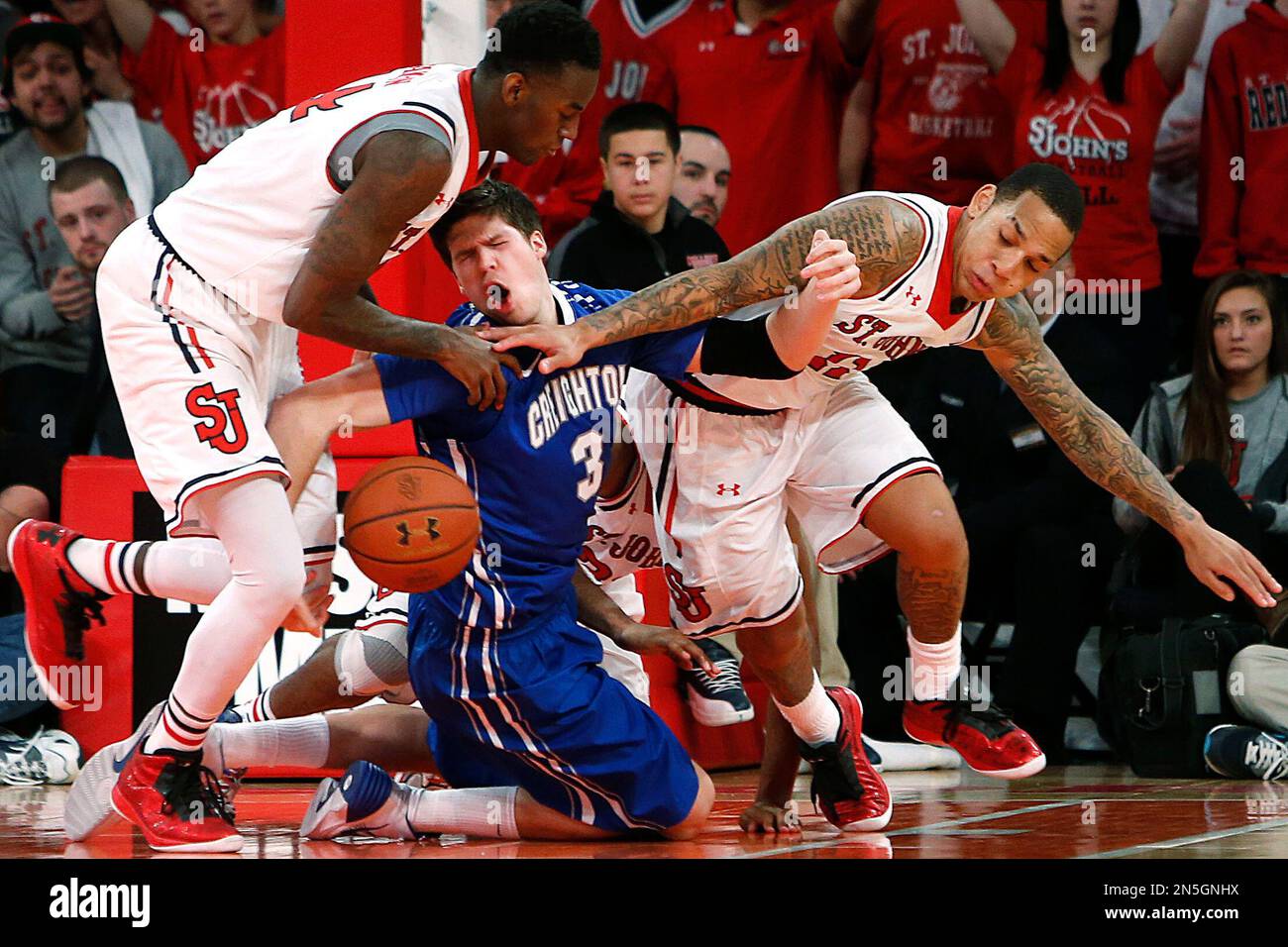 Creighton's Doug McDermott (3) fights for a loose ball with St. John's ...