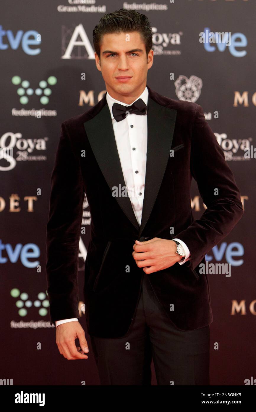 Spanish actor Maxi Iglesias poses for photographers on the red carpet ...