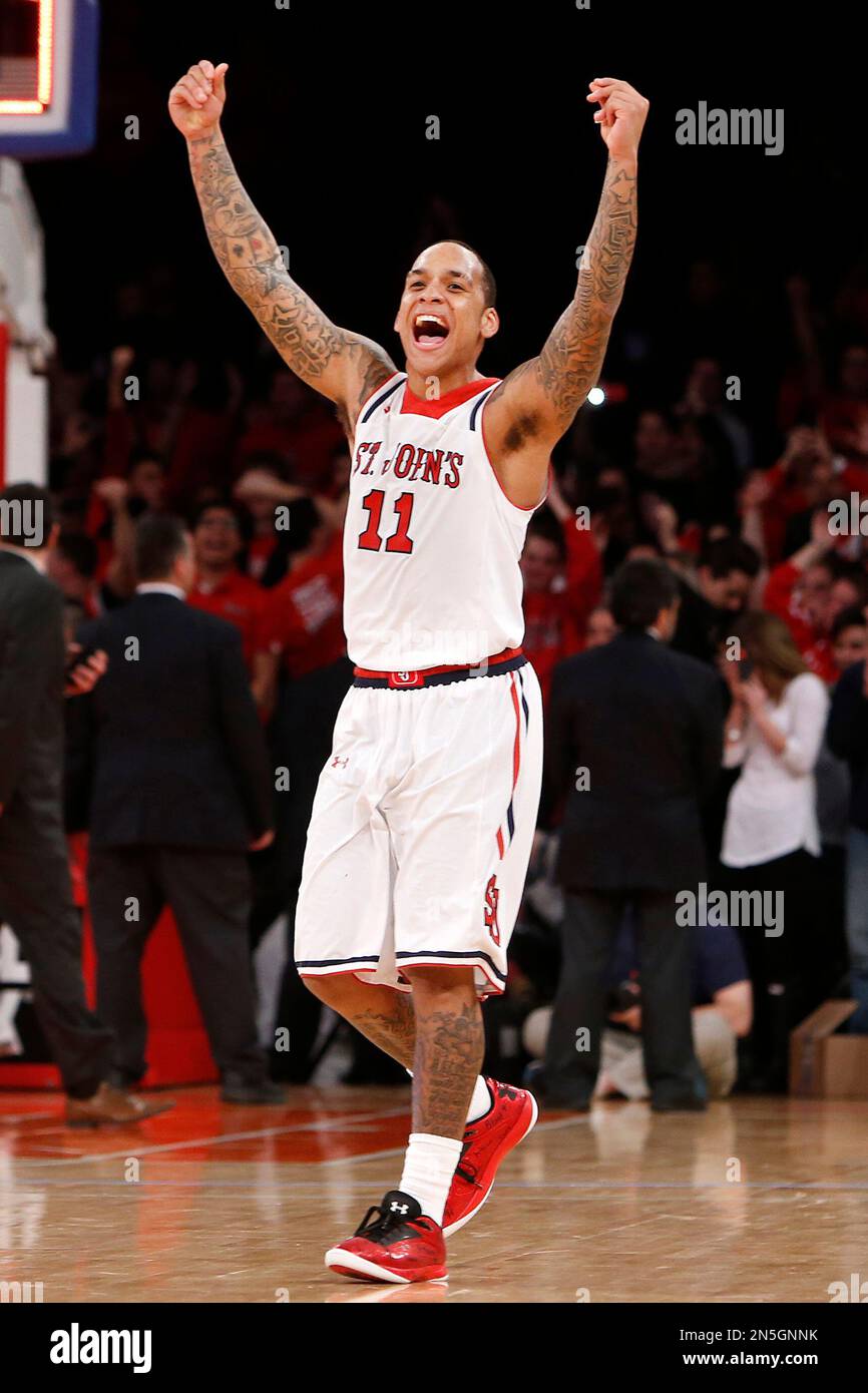 St. John's D'Angelo Harrison (11) celebrates at the end of an NCAA ...