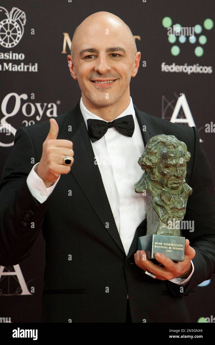 Spanish actor Roberto Alamo holds the Goya trophy after winning in the ...