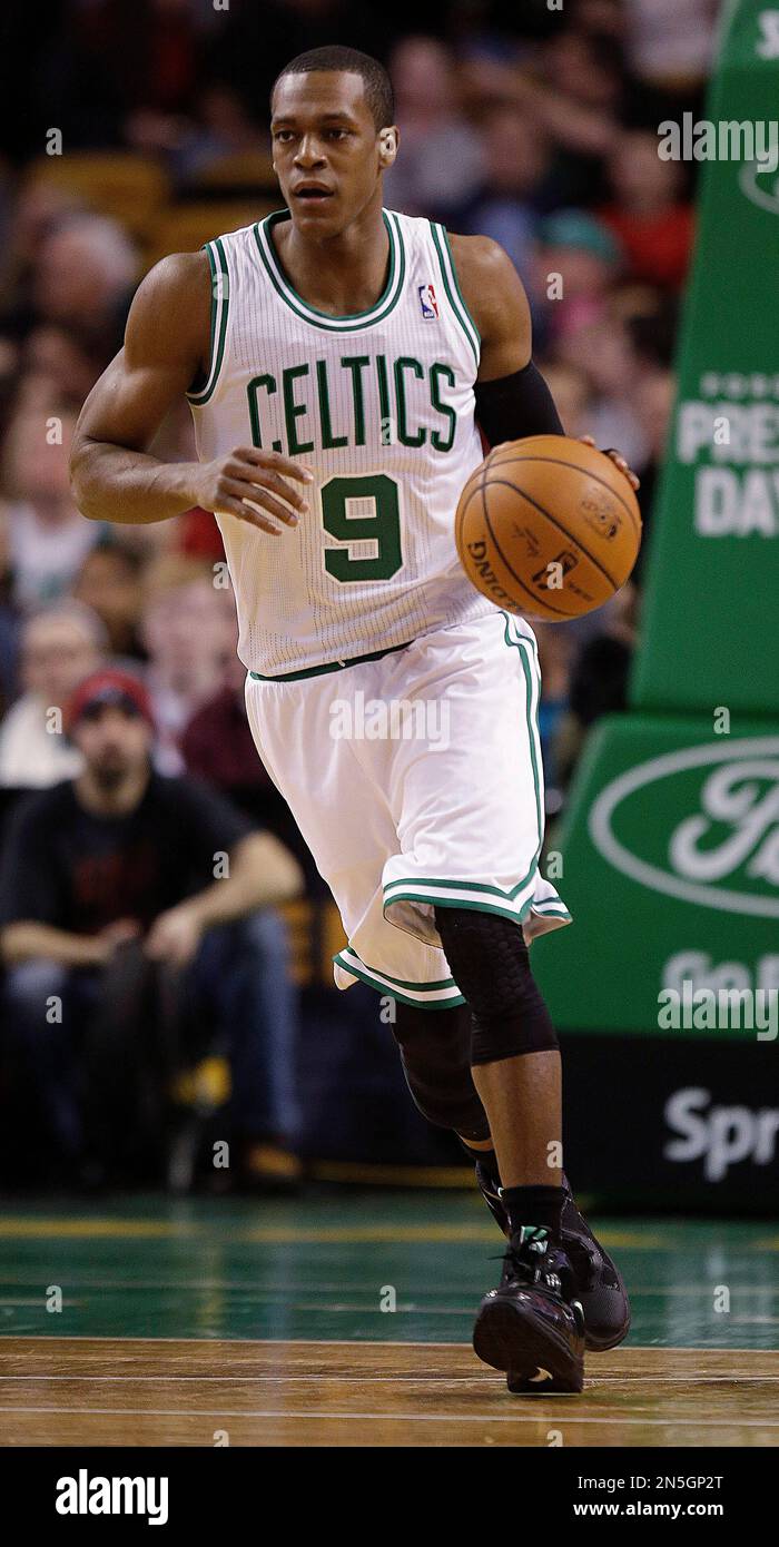 Boston Celtics point guard Rajon Rondo (9) brings the ball up court ...