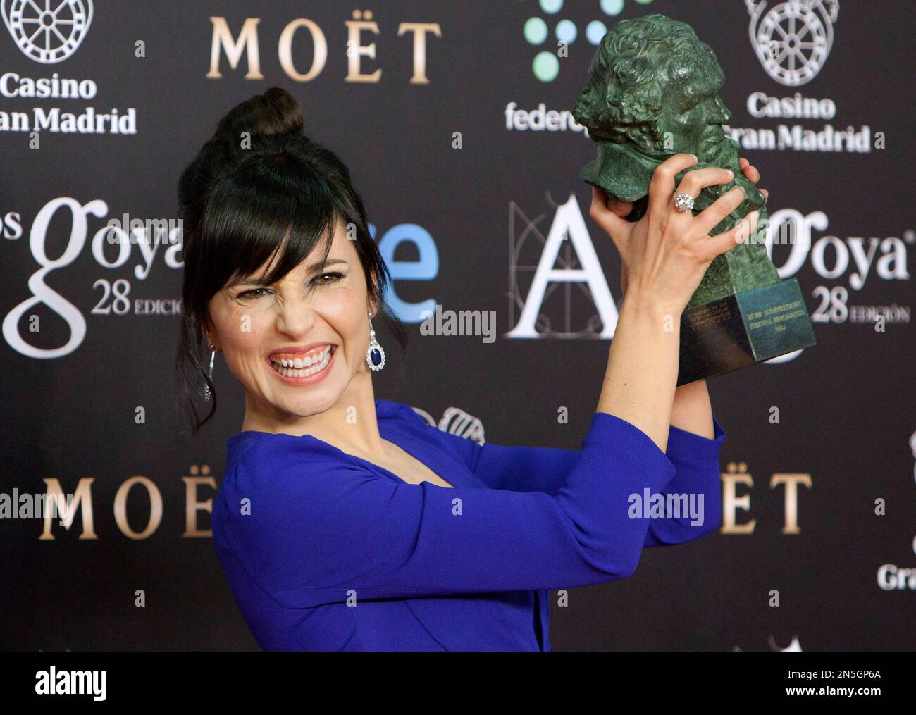 Spanish actress Marian Alvarez holds her Goya trophy after winning the ...
