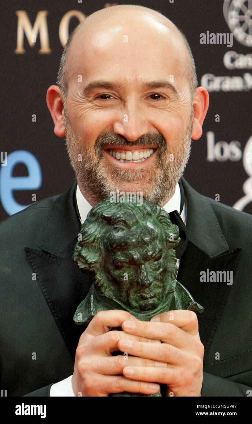 Spanish actor Javier Camara holds his Goya award after winning the best ...