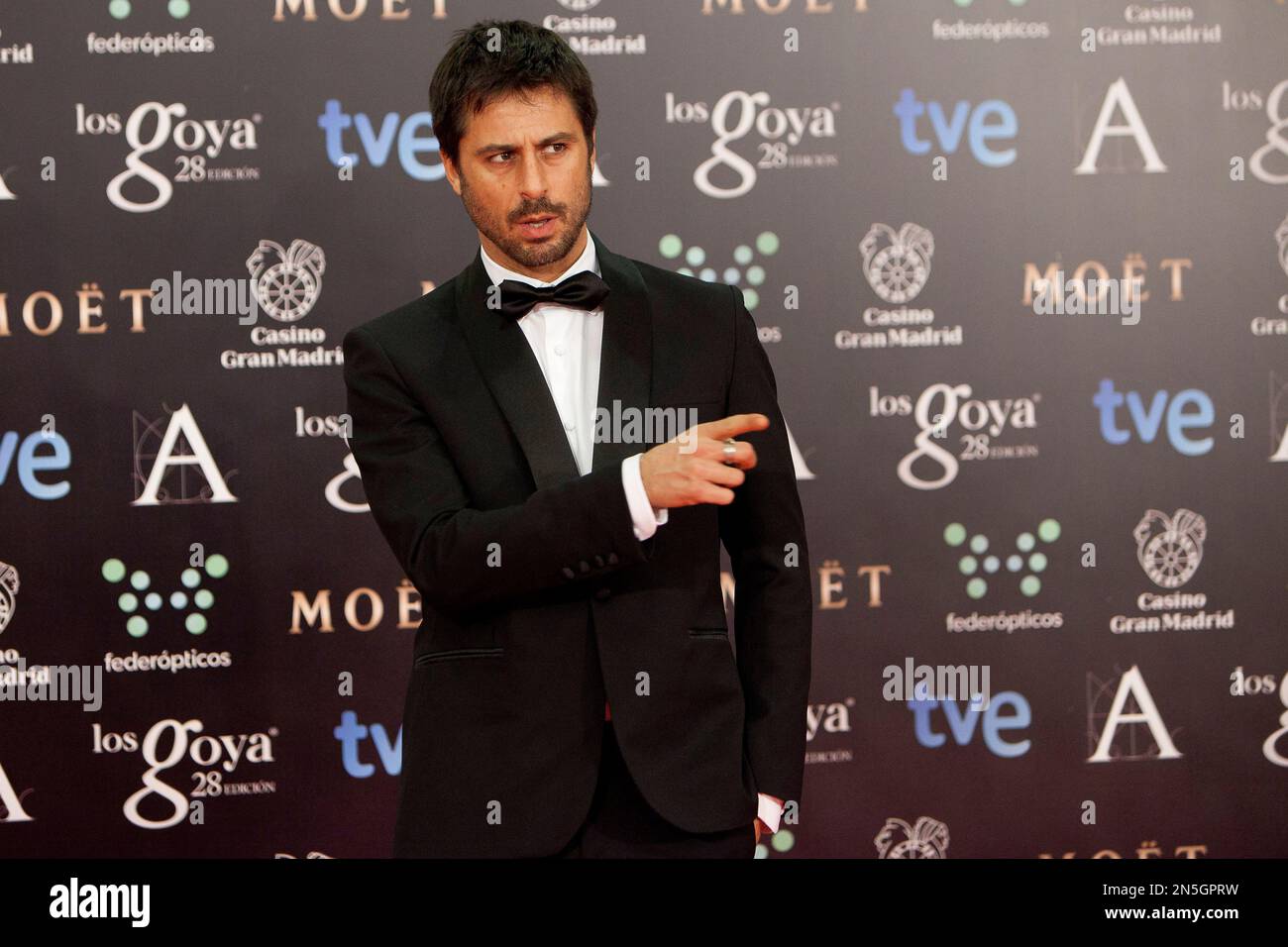 Spanish actor Hugo Silva poses for photographers on the red carpet ...
