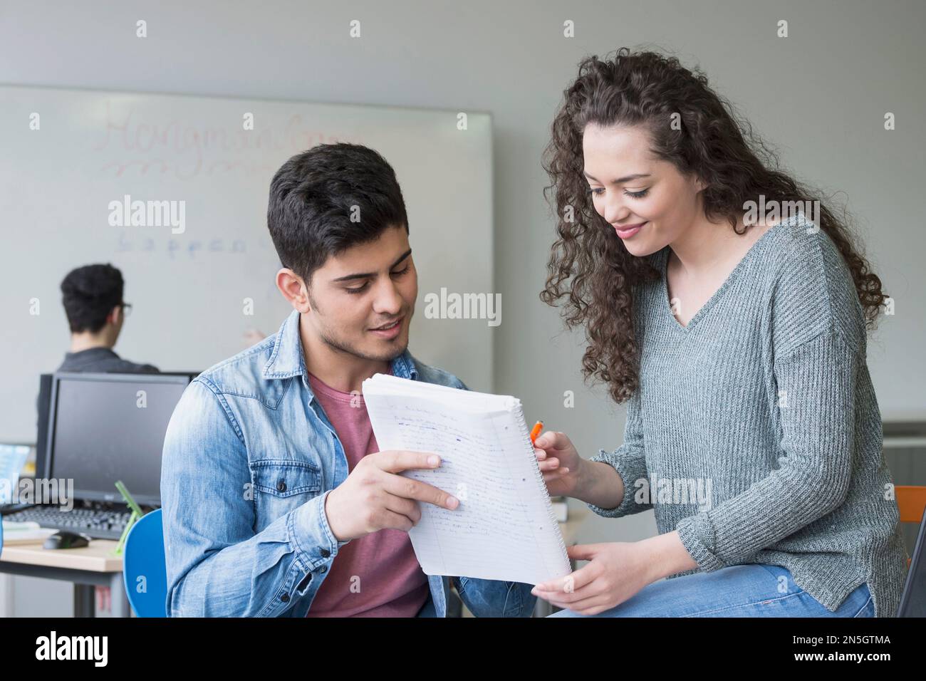 University students studying with notes in classroom School, Bavaria ...