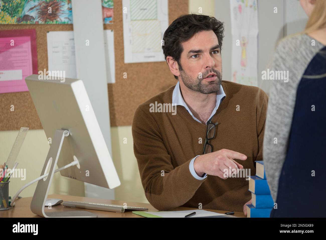 Teacher having a serious talk to a student School, Bavaria, Germany ...
