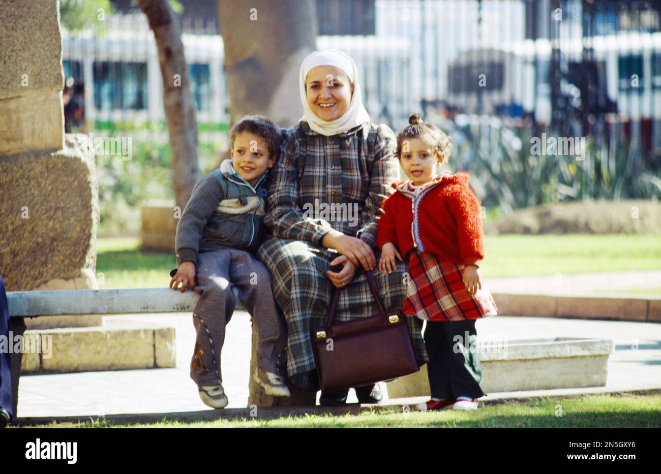 Cairo Egypt Portrait of Family Smiling Sitting outside National Museum ...
