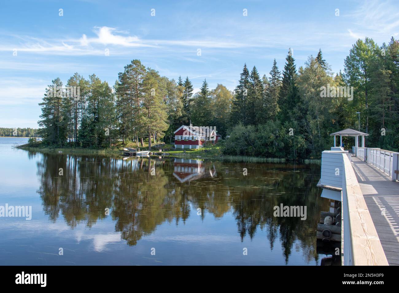 Autumn in Sweden - traditional red little cabin at a lake. By Lake ...