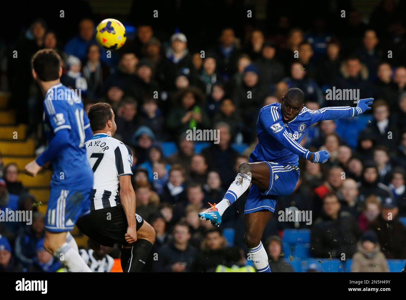 Chelsea's Demba Ba, right, attempts a shot at Newcastle United's goal ...