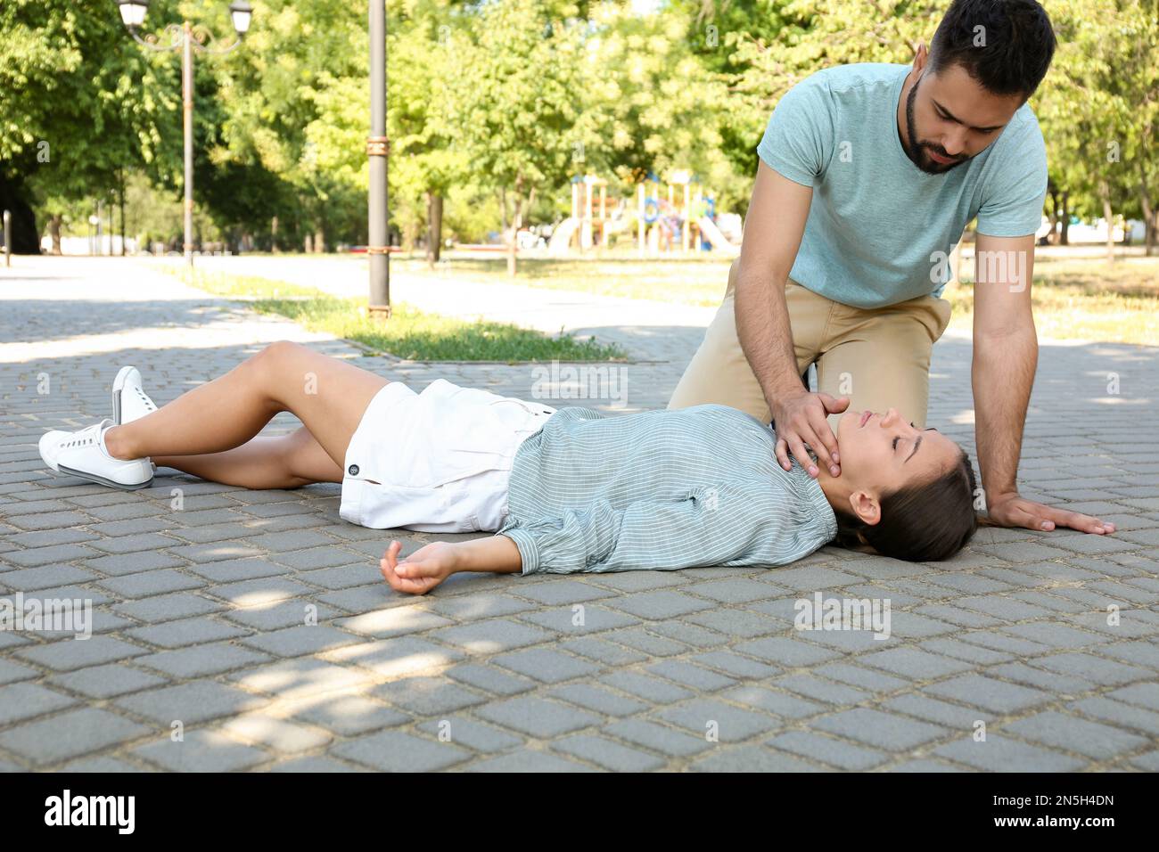 Stranger helping woman hi-res stock photography and images - Alamy
