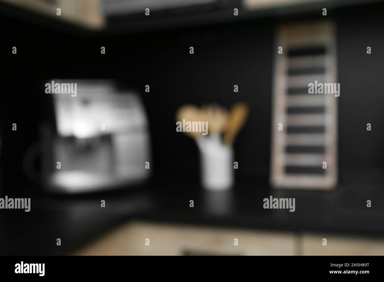 Blurred view of kitchen interior with modern furniture Stock Photo - Alamy