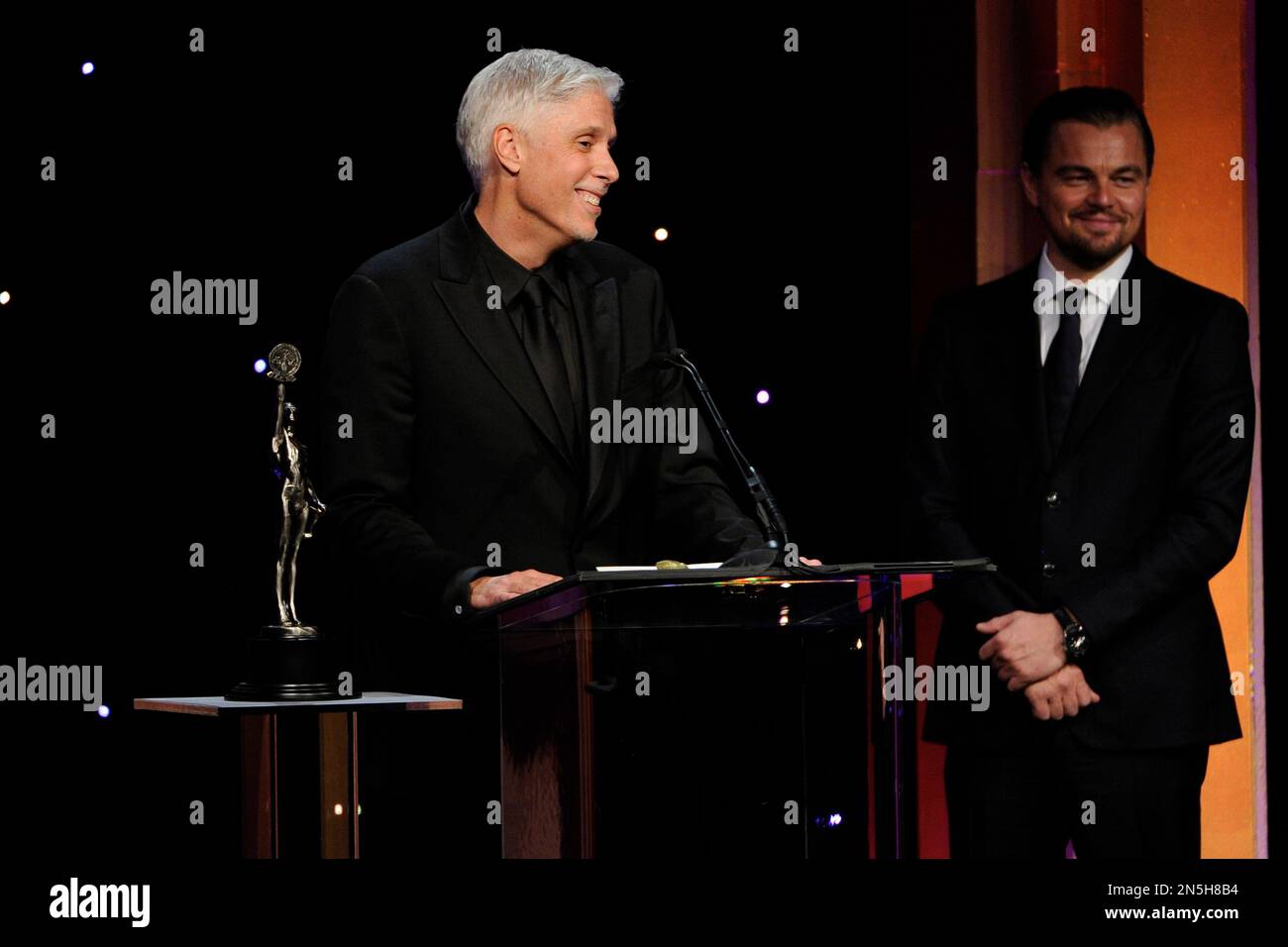 Christopher Rouse, left, accepts the best edited feature film ...