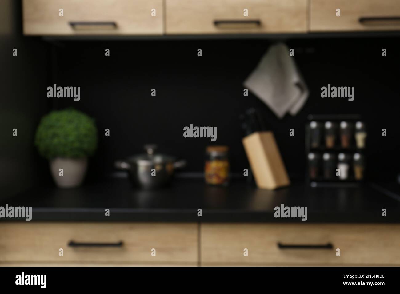 Blurred view of kitchen interior with modern furniture Stock Photo - Alamy