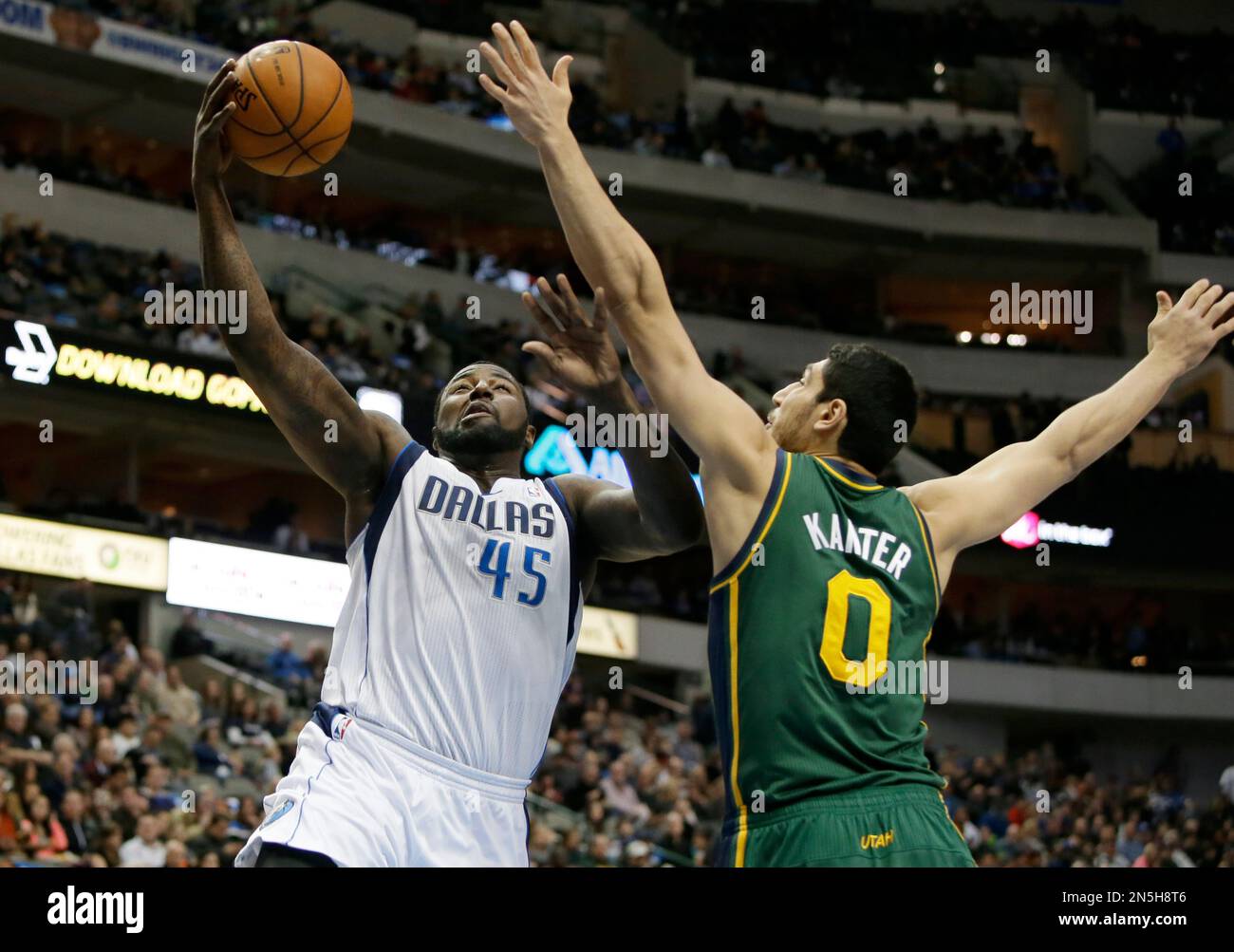 Dallas Mavericks center DeJuan Blair (45) goes up for a layup as Utah ...