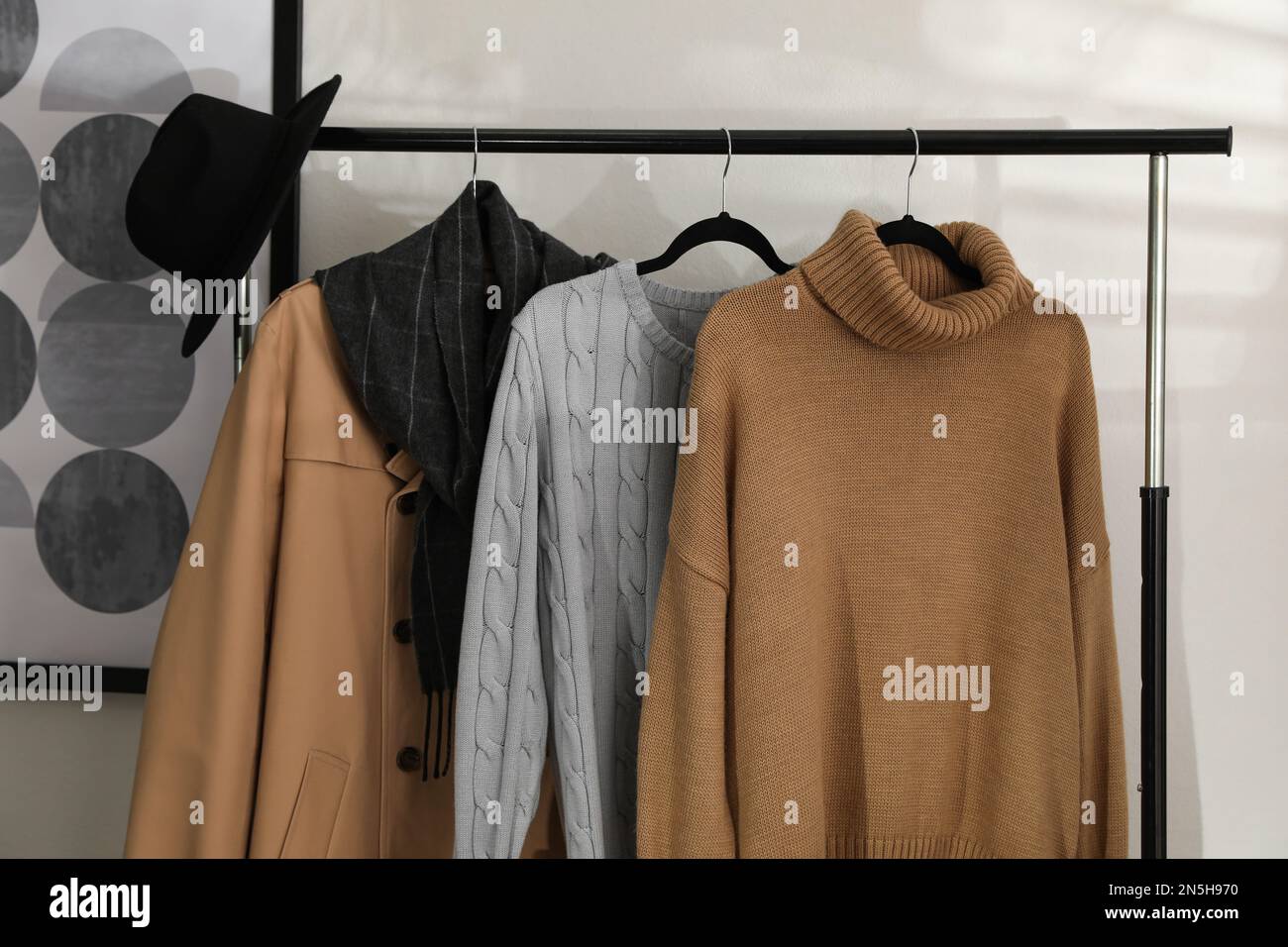 Warm sweater hangers clothes hi-res stock photography and images - Alamy