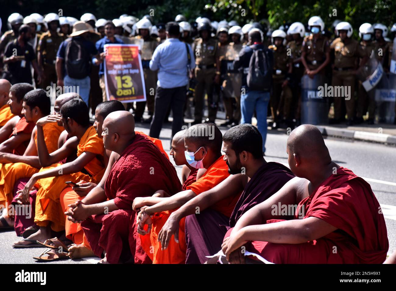 Colombo, Sri Lanka. 08th Feb, 2023. The Buddhist monks sit on road ...