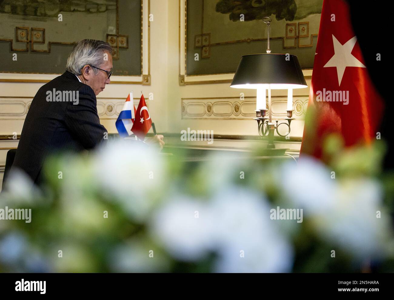 THE HAGUE - The Japanese ambassador signs the condolence register at ...