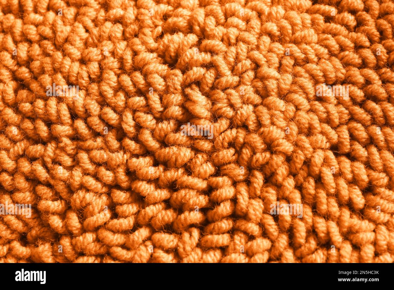 Orange woolen threads as background, top view Stock Photo - Alamy