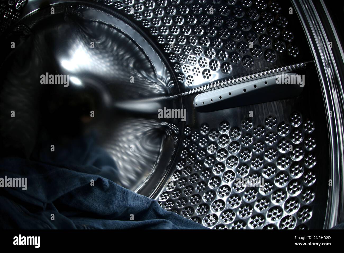 Empty washing machine drum, closeup view. Laundry day Stock Photo - Alamy
