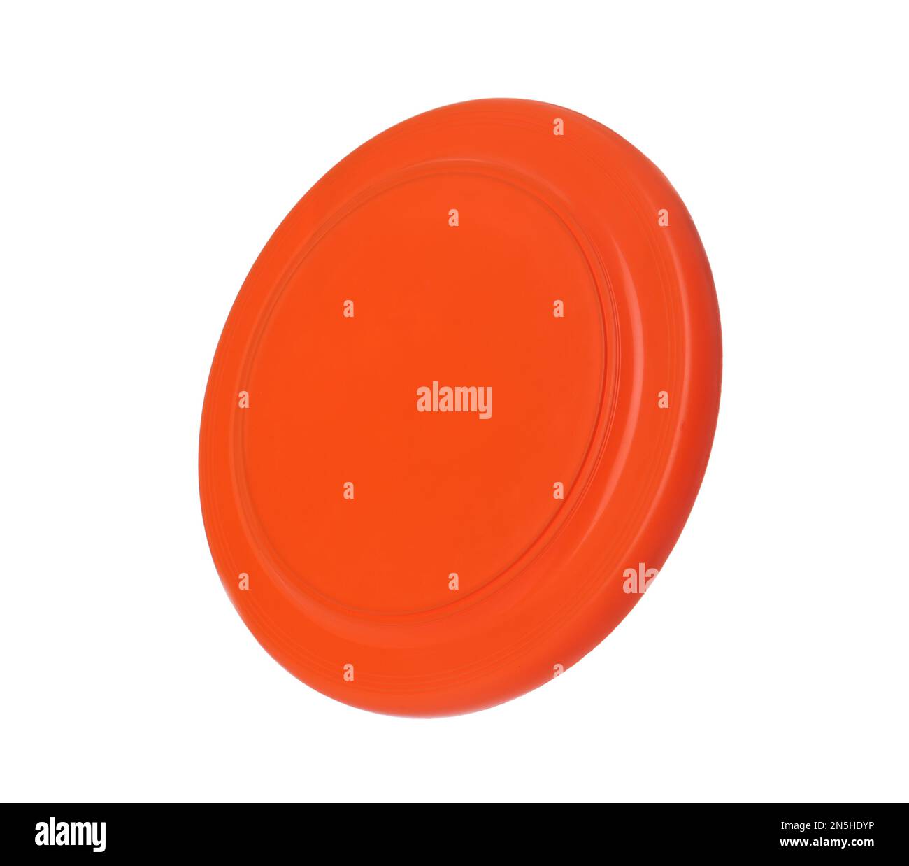 Orange plastic frisbee disk isolated on white Stock Photo - Alamy