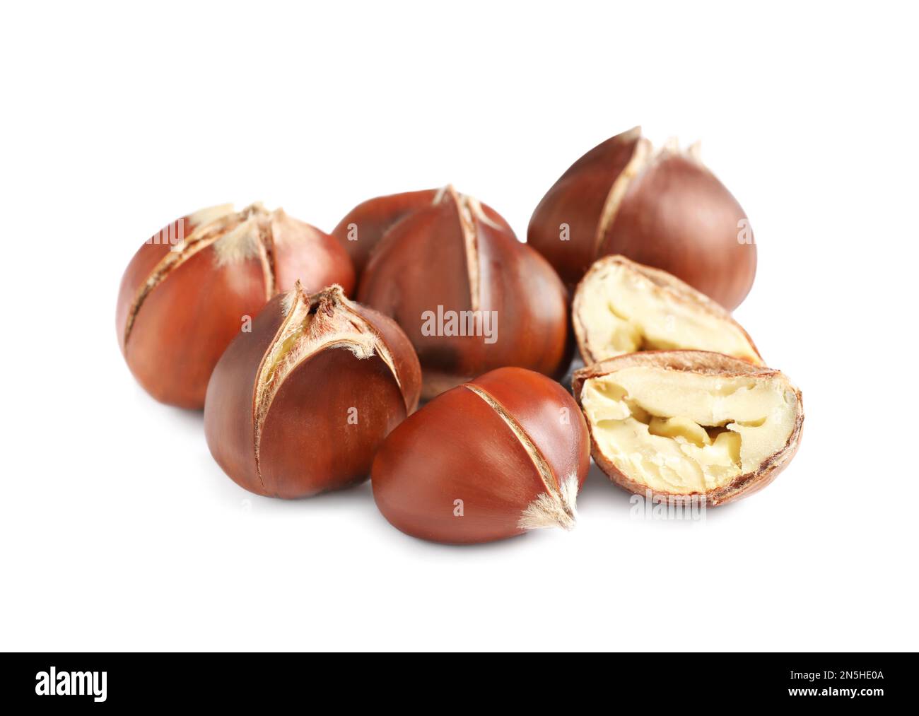 Delicious sweet roasted edible chestnuts isolated on white Stock Photo ...