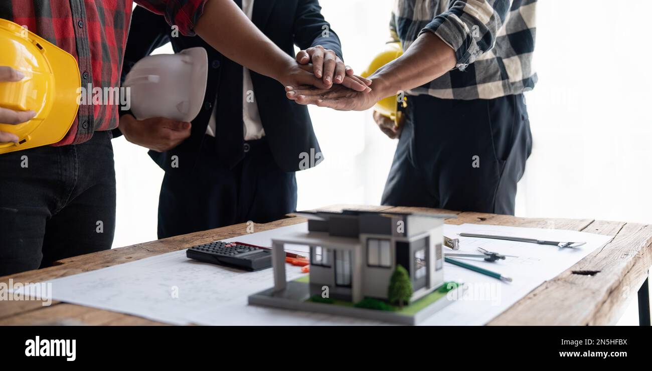 Engineer team to join hands together, accept agree cooperation and ...