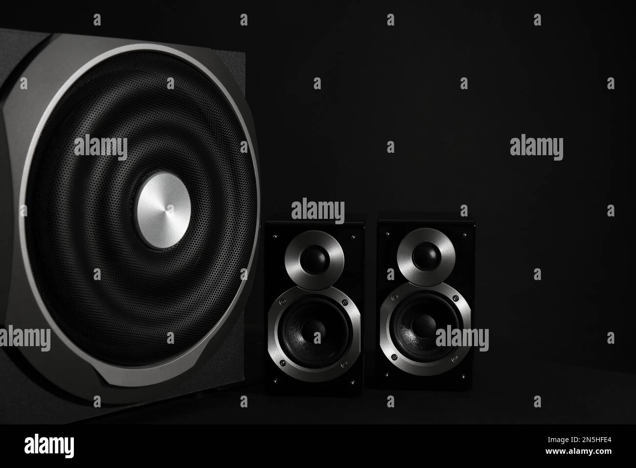 Modern powerful audio speaker system on black background Stock Photo ...