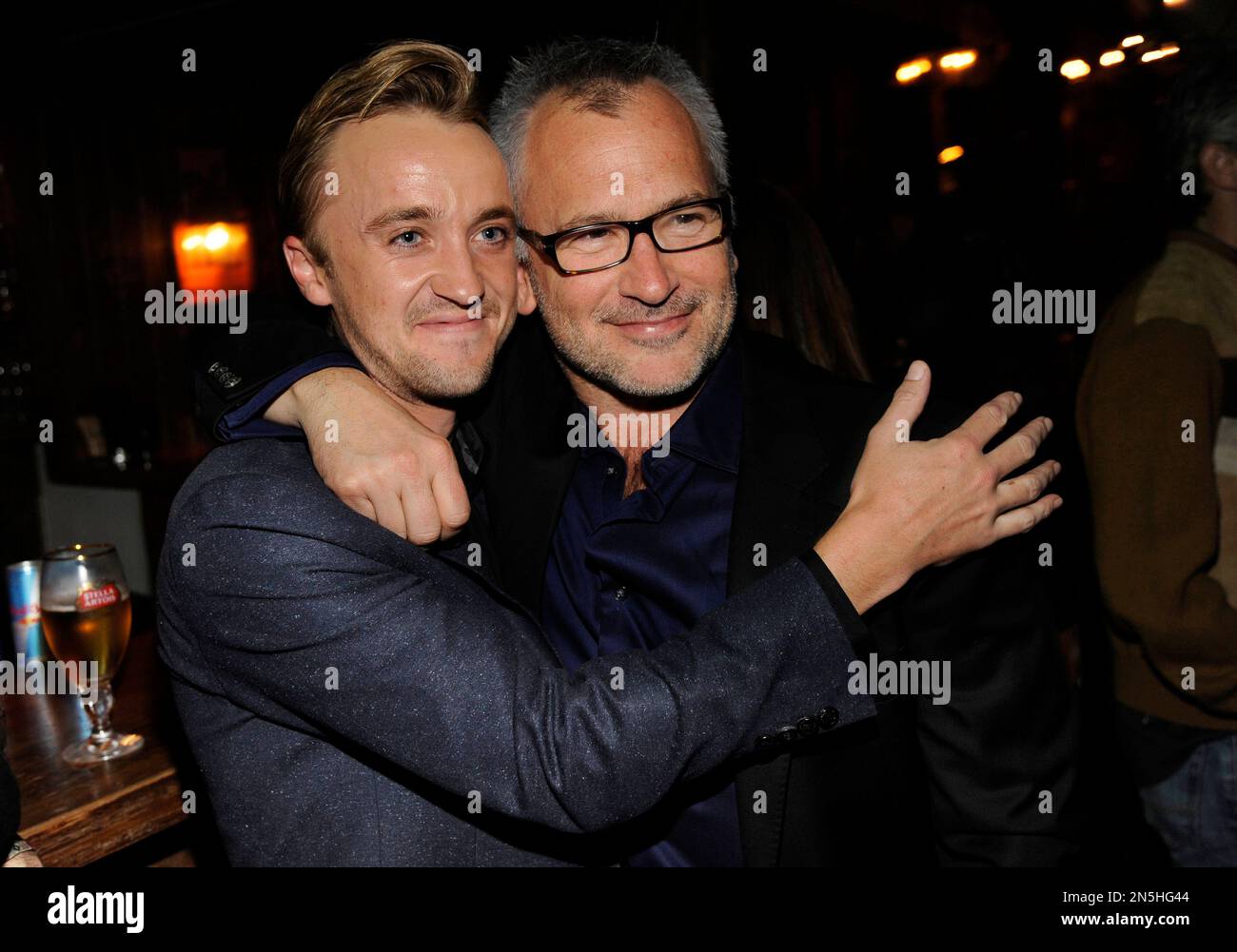 Tom Felton, left, a cast member in "In Secret," poses with the film's ...