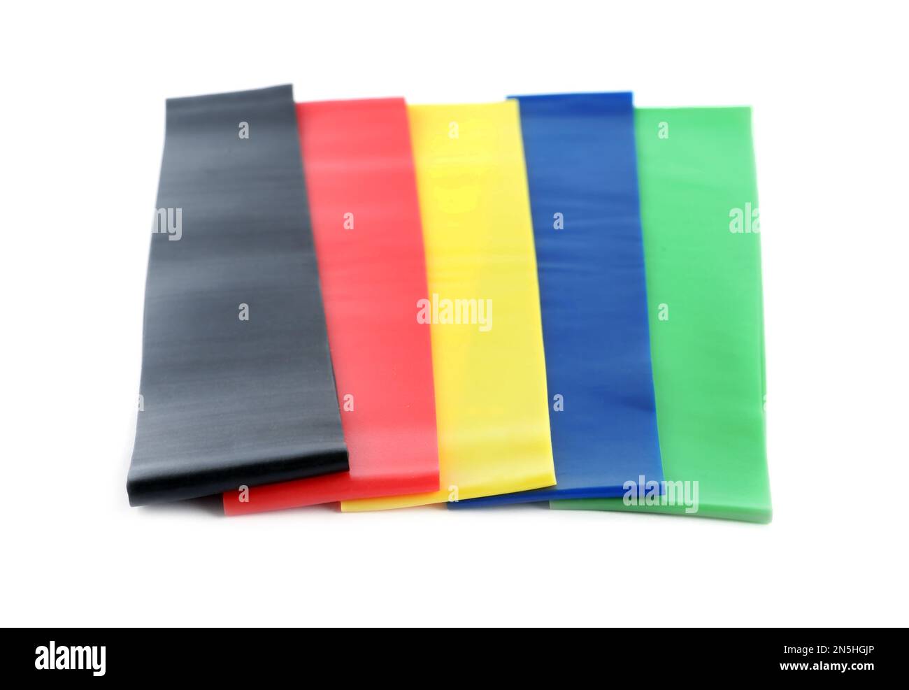 Set of fitness elastic bands on white background Stock Photo - Alamy