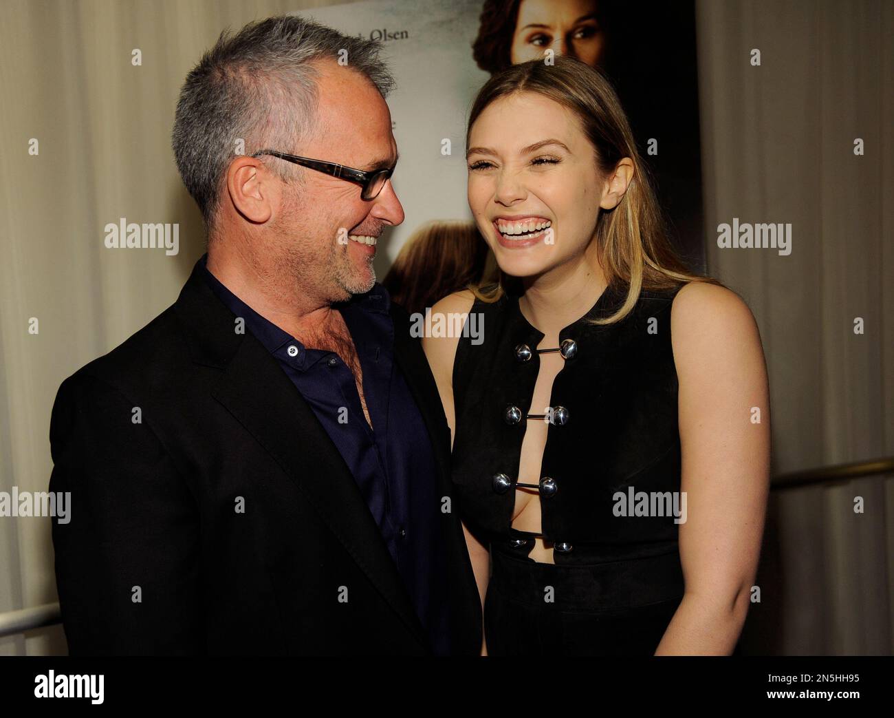 Charlie Stratton, left, writer/director of "In Secret," shares a laugh ...