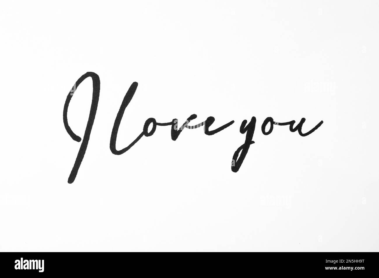 Handwritten text I Love You on white background Stock Photo - Alamy