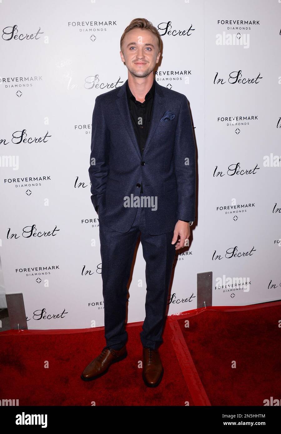 Tom Felton arrives at the Los Angeles premiere of "In Secret" at ...