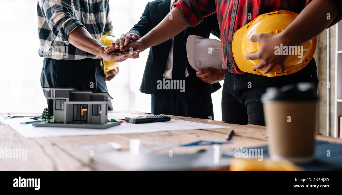 Engineer team to join hands together, accept agree cooperation and ...