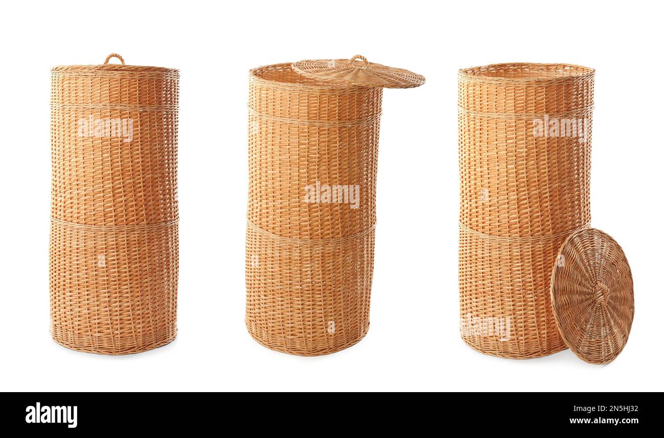 Set with empty wicker baskets on white background Stock Photo - Alamy