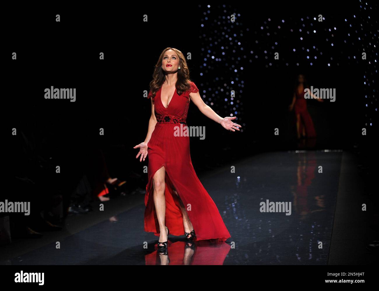 Chef Giada De Laurentiis walks the runway as she models an outfit from ...