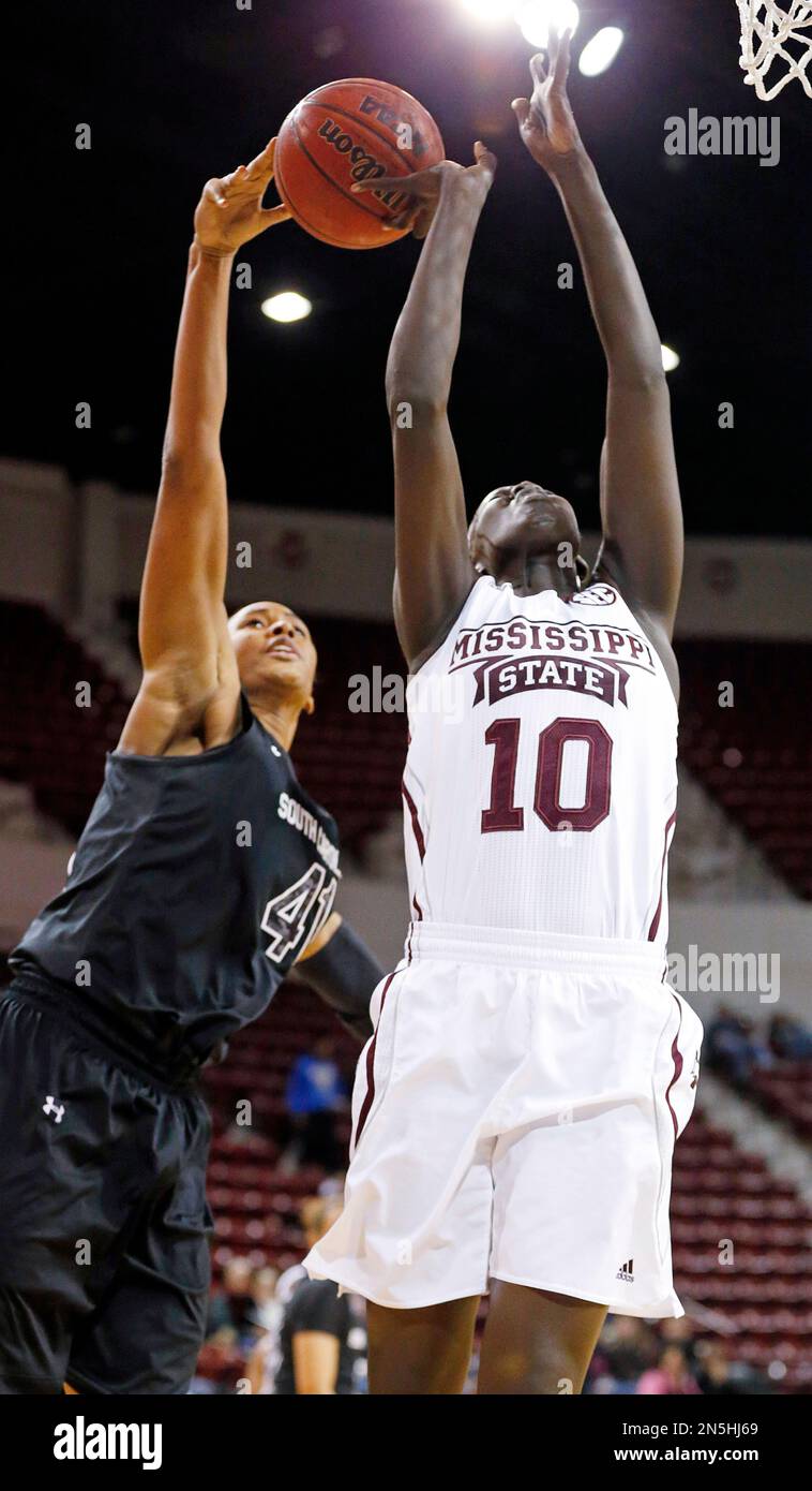 Mississippi State center Martha Alwal (10) has her layup blocked by South Carolina center Alaina ...